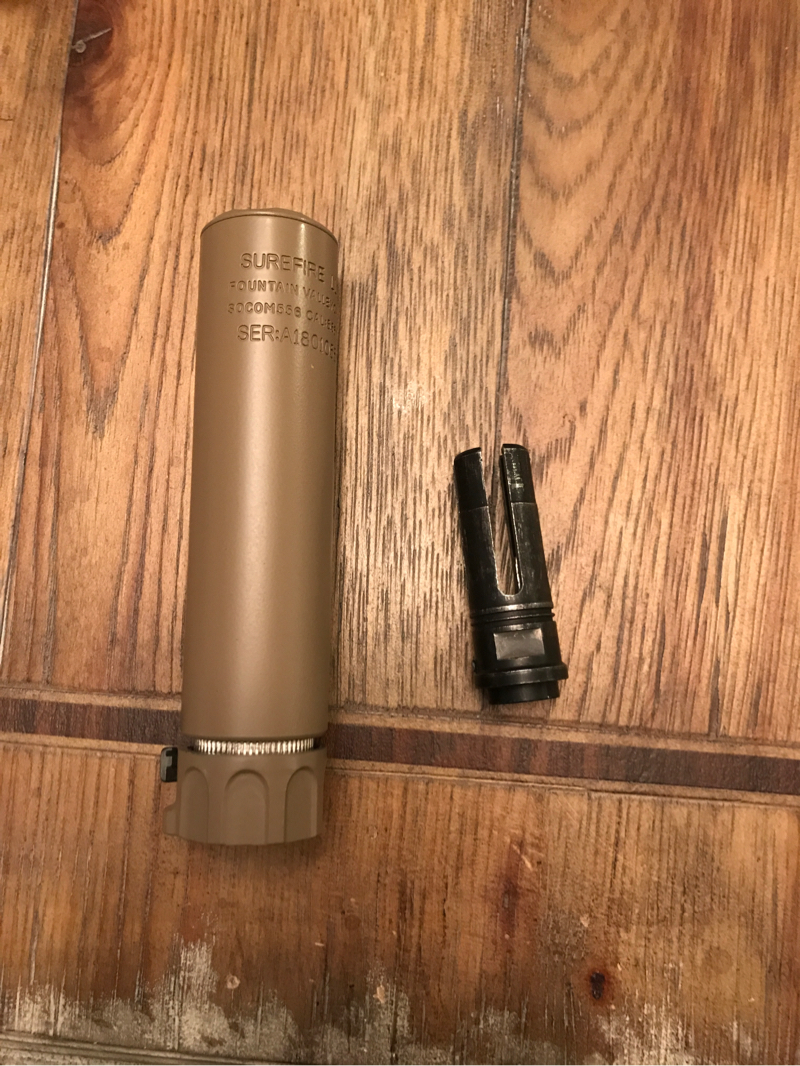 SOLD Surefire Socom 556 suppressor/4 prong flash hider | HopUp Airsoft
